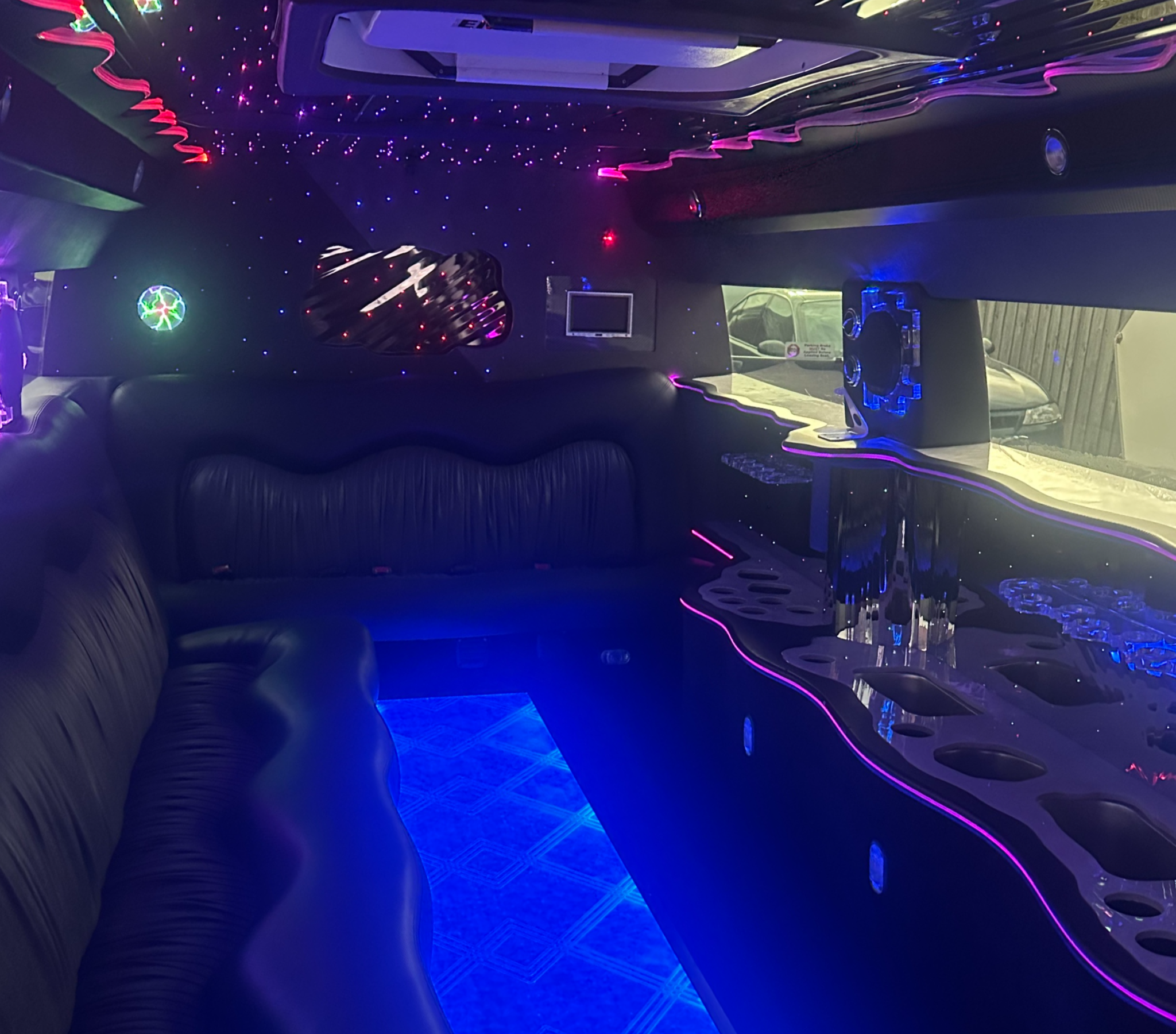 14 seater white Hummer limo - SUPERIOR LIMOUSINES